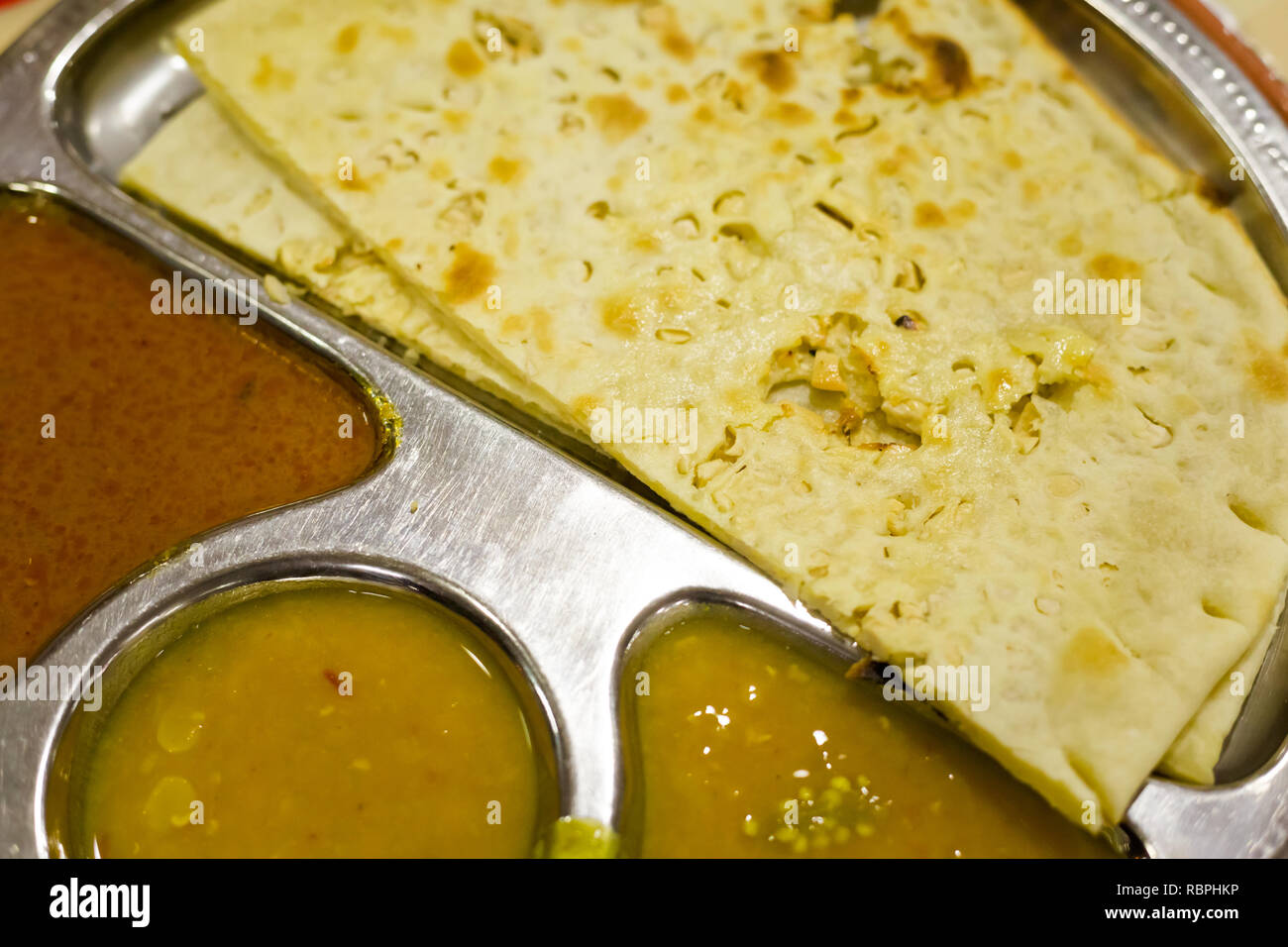 Roti prata hi-res stock photography and images - Alamy