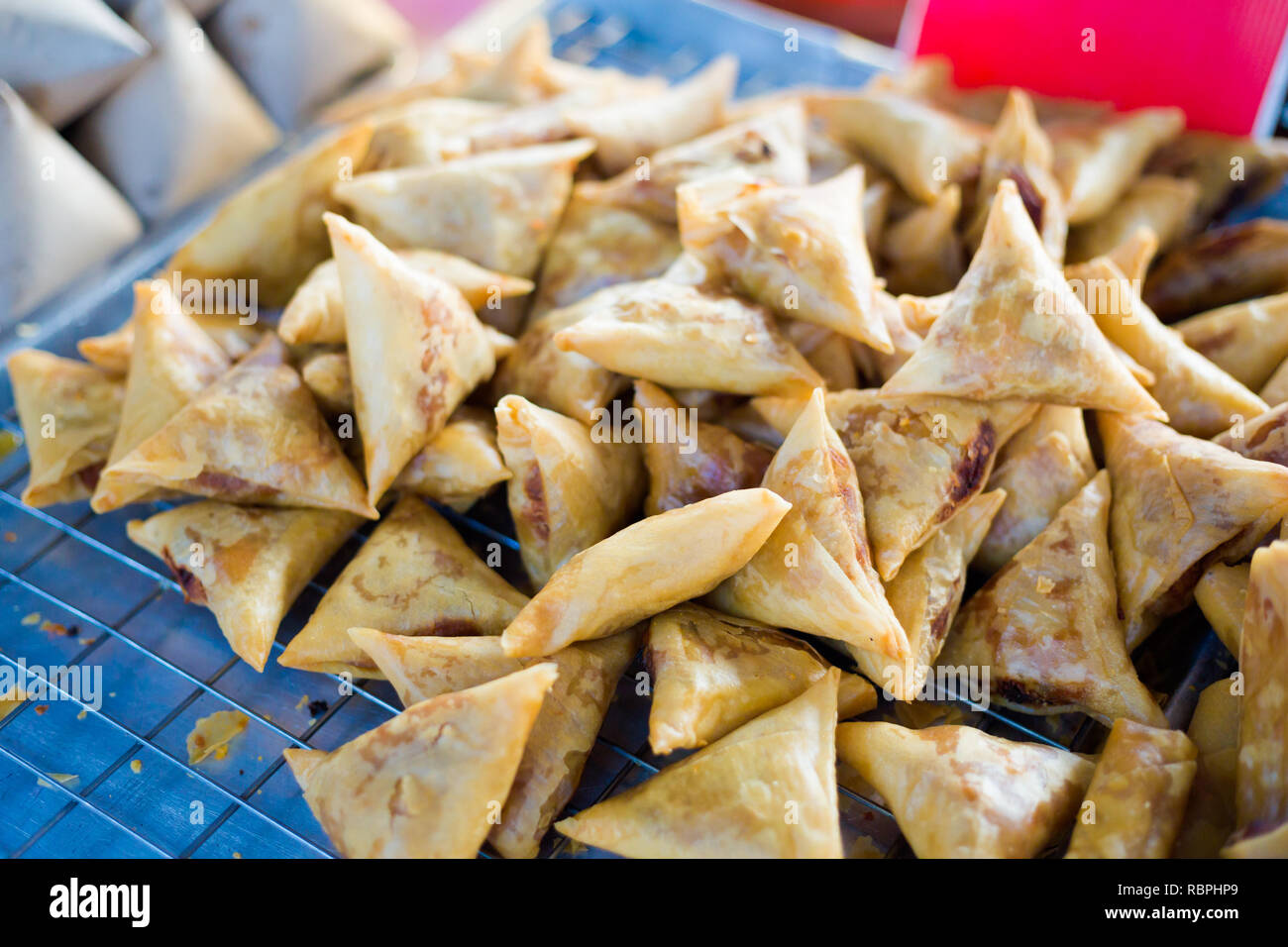 Fresh prepared malaysian deepfried samosa dumplings on local market on ...