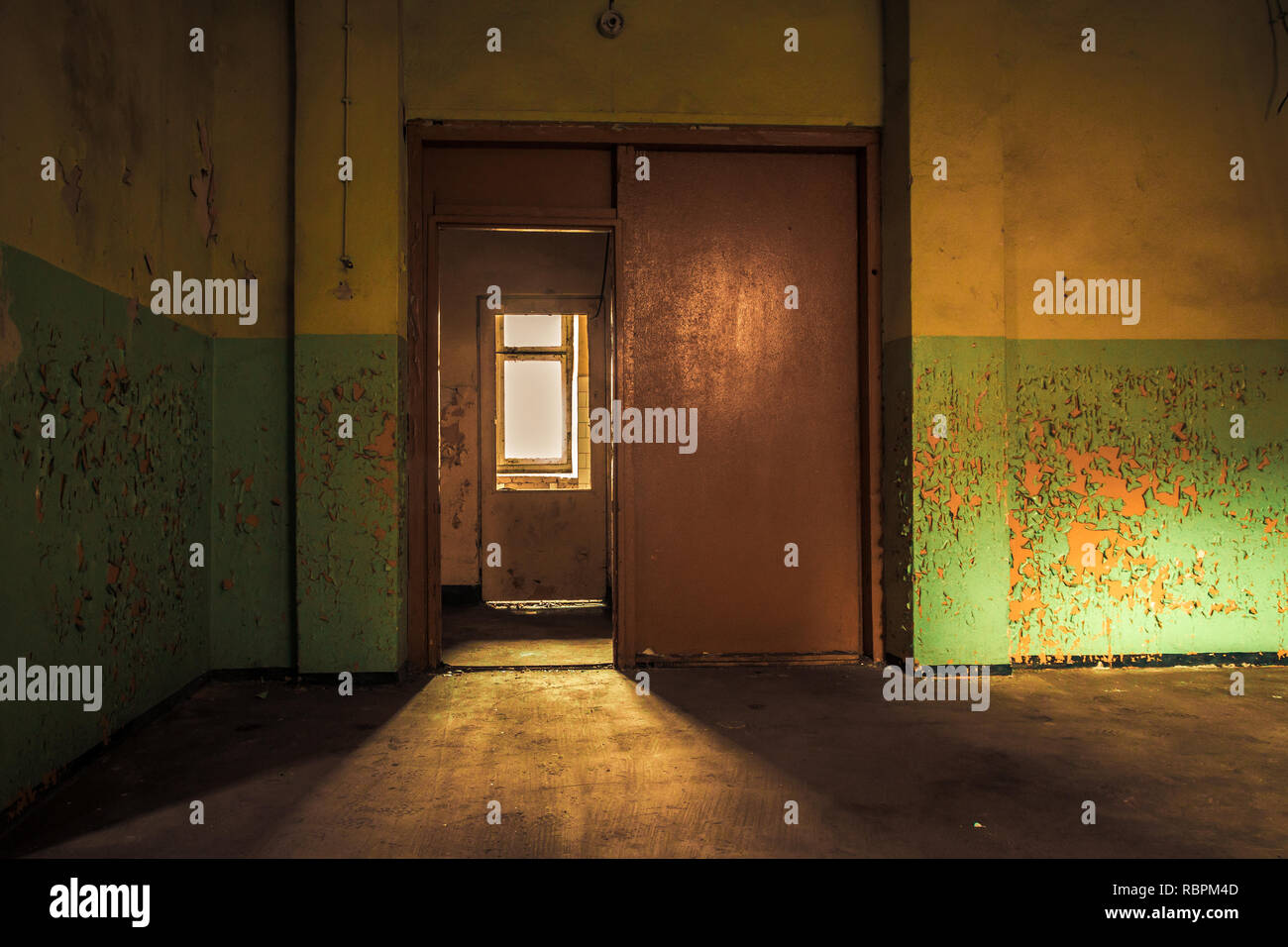 Dark interior inside abandoned old factory building Stock Photo - Alamy