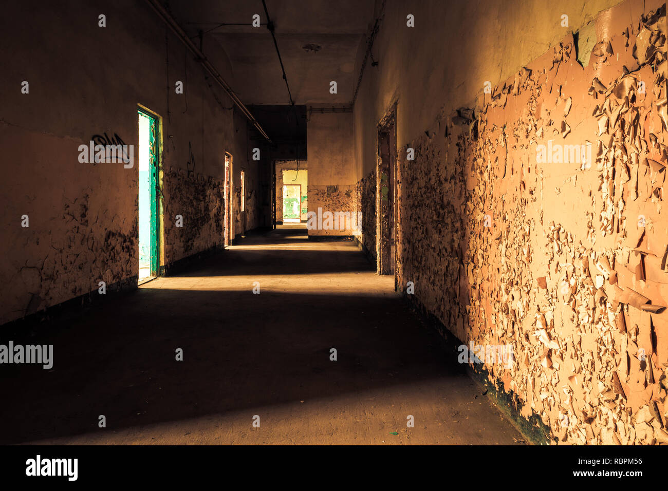Dark interior inside abandoned old factory building Stock Photo - Alamy