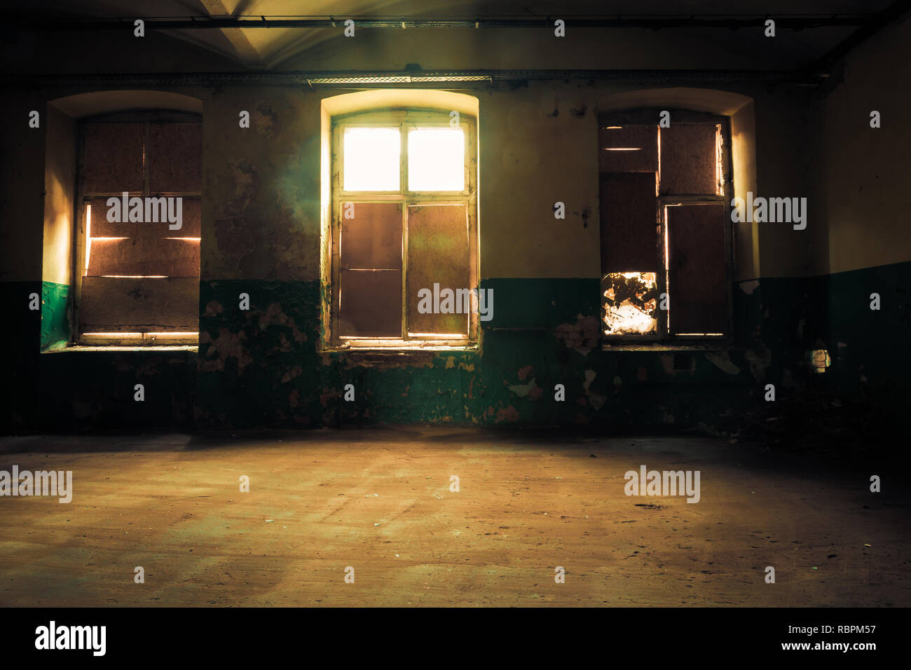 Dark interior inside abandoned old factory building Stock Photo - Alamy