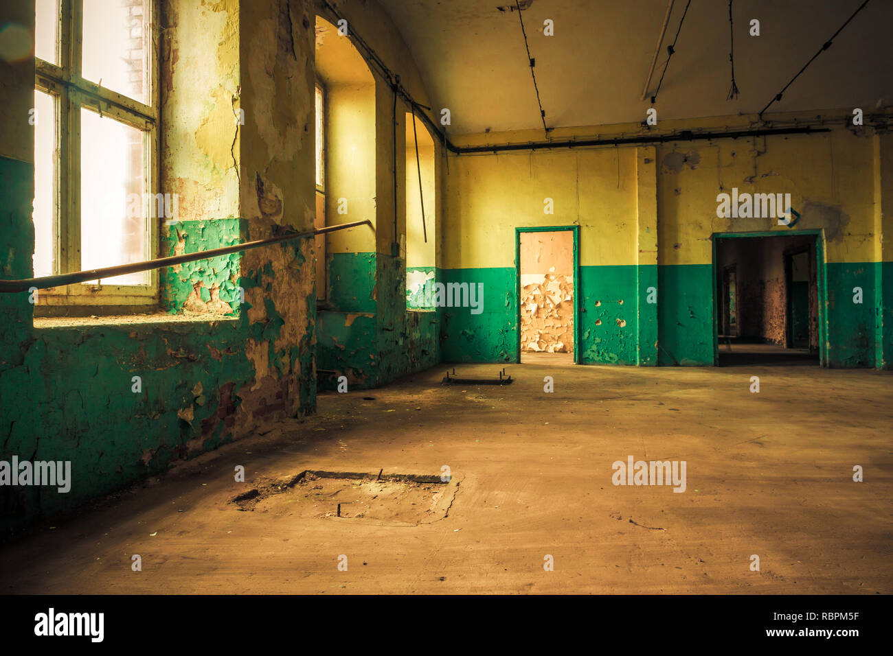 Dark interior inside abandoned old factory building Stock Photo - Alamy