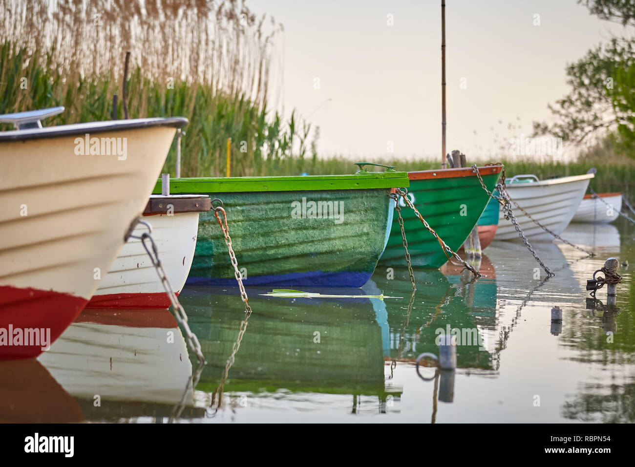 Fisher boats on the harbor Stock Photo - Alamy