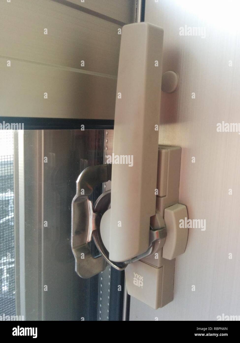 ‘YKK AP‘ lock on a Japanese balcony door, showing all positions - 1 ...