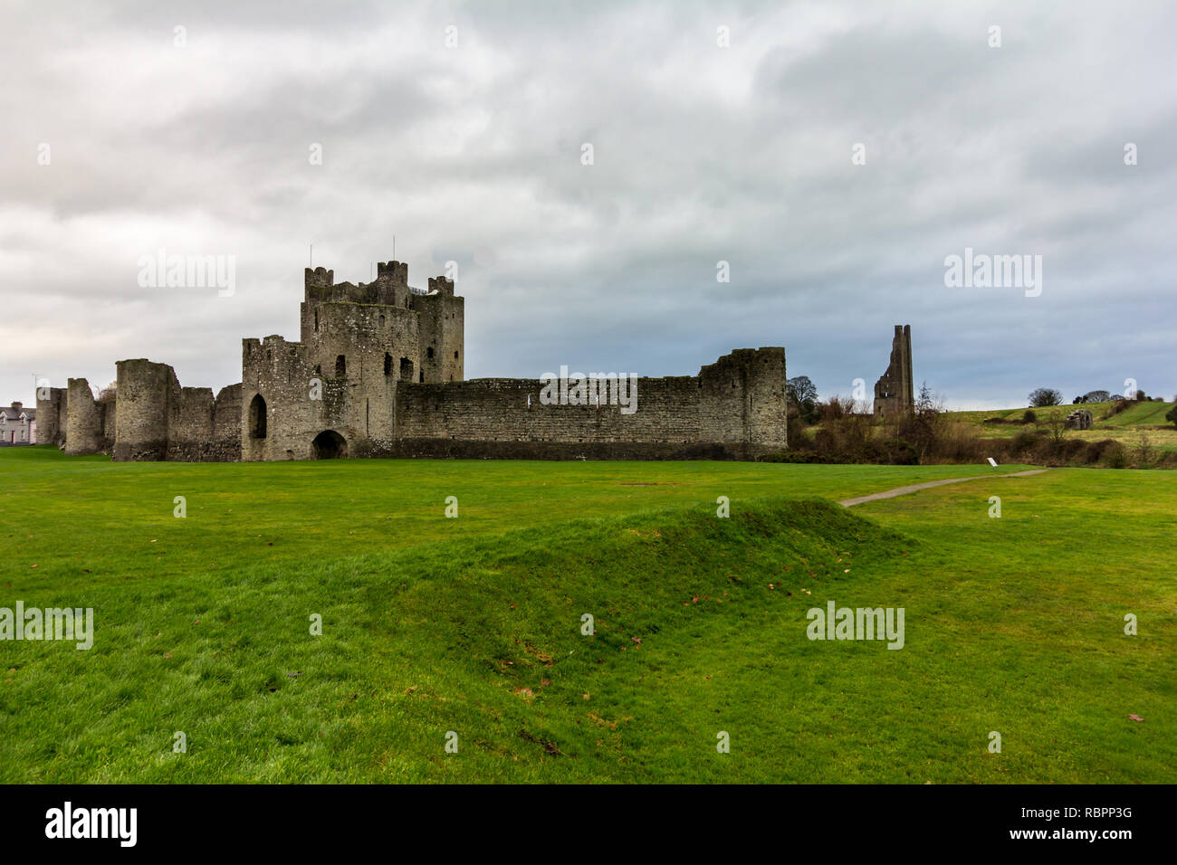 Castle trim in Trim, Ireland with the ruins of Saint Mary's Abbey in ...
