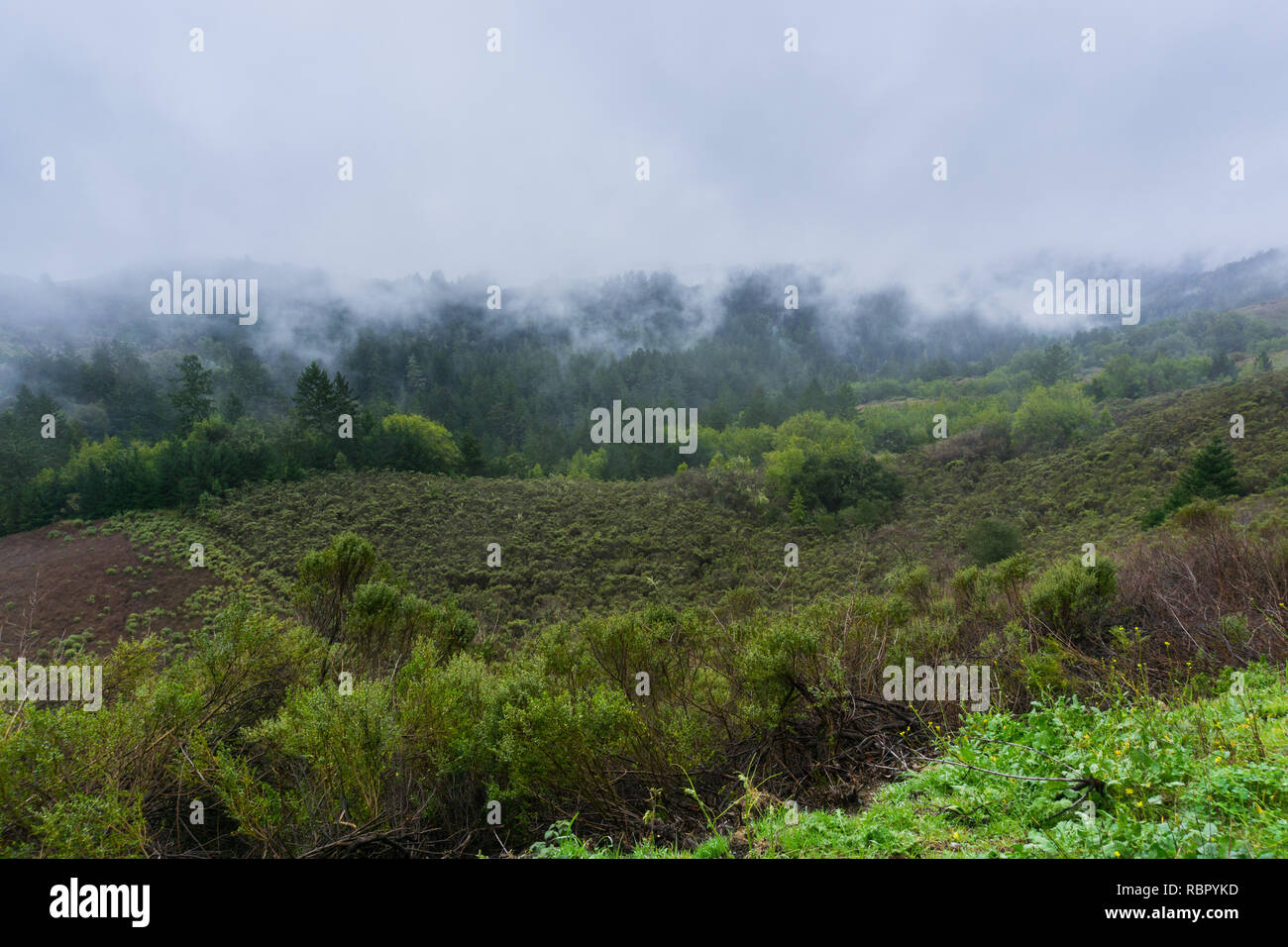 Weather changing over hills mountains hi-res stock photography and ...