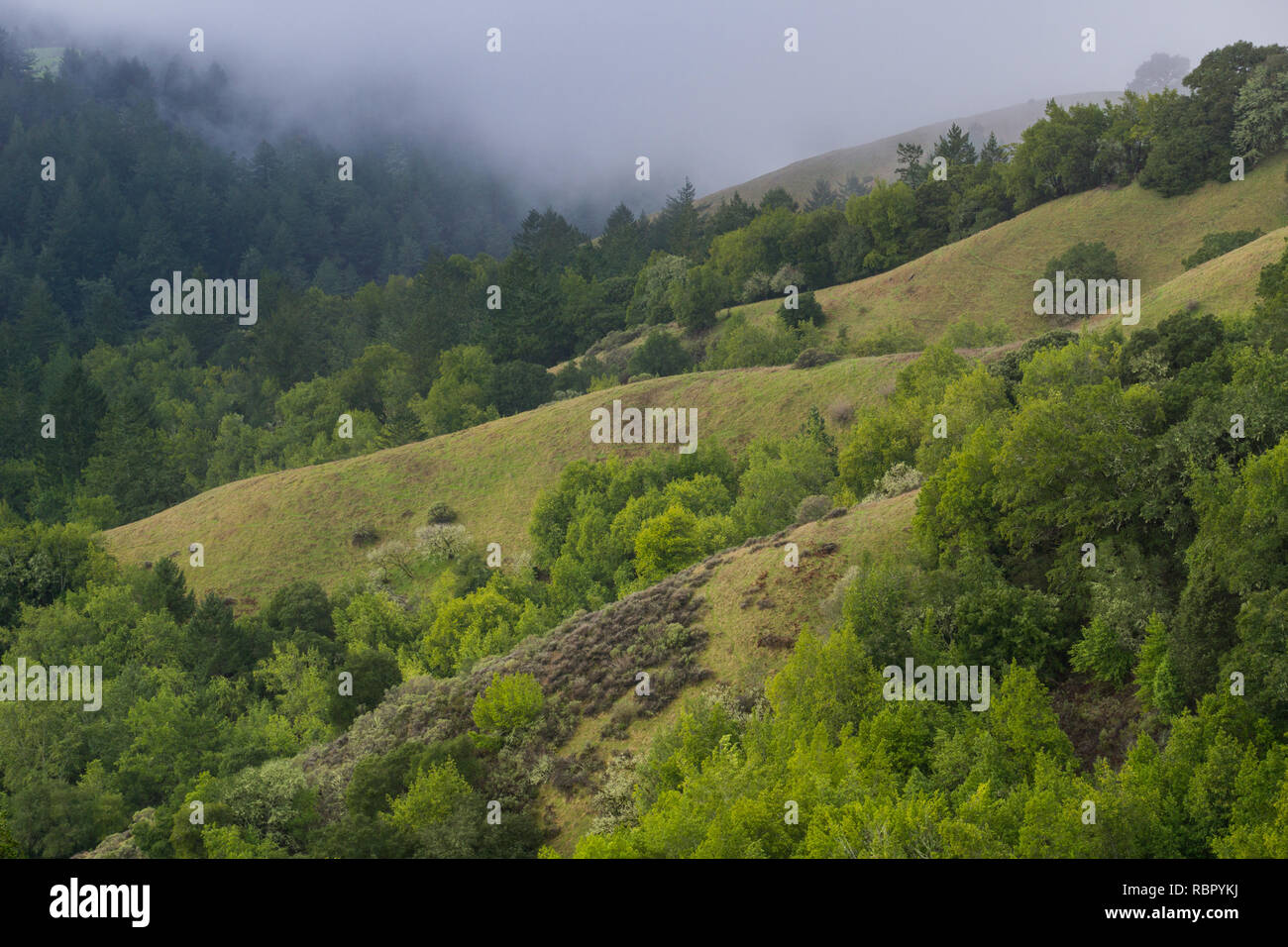 Weather changing over hills mountains hi-res stock photography and ...