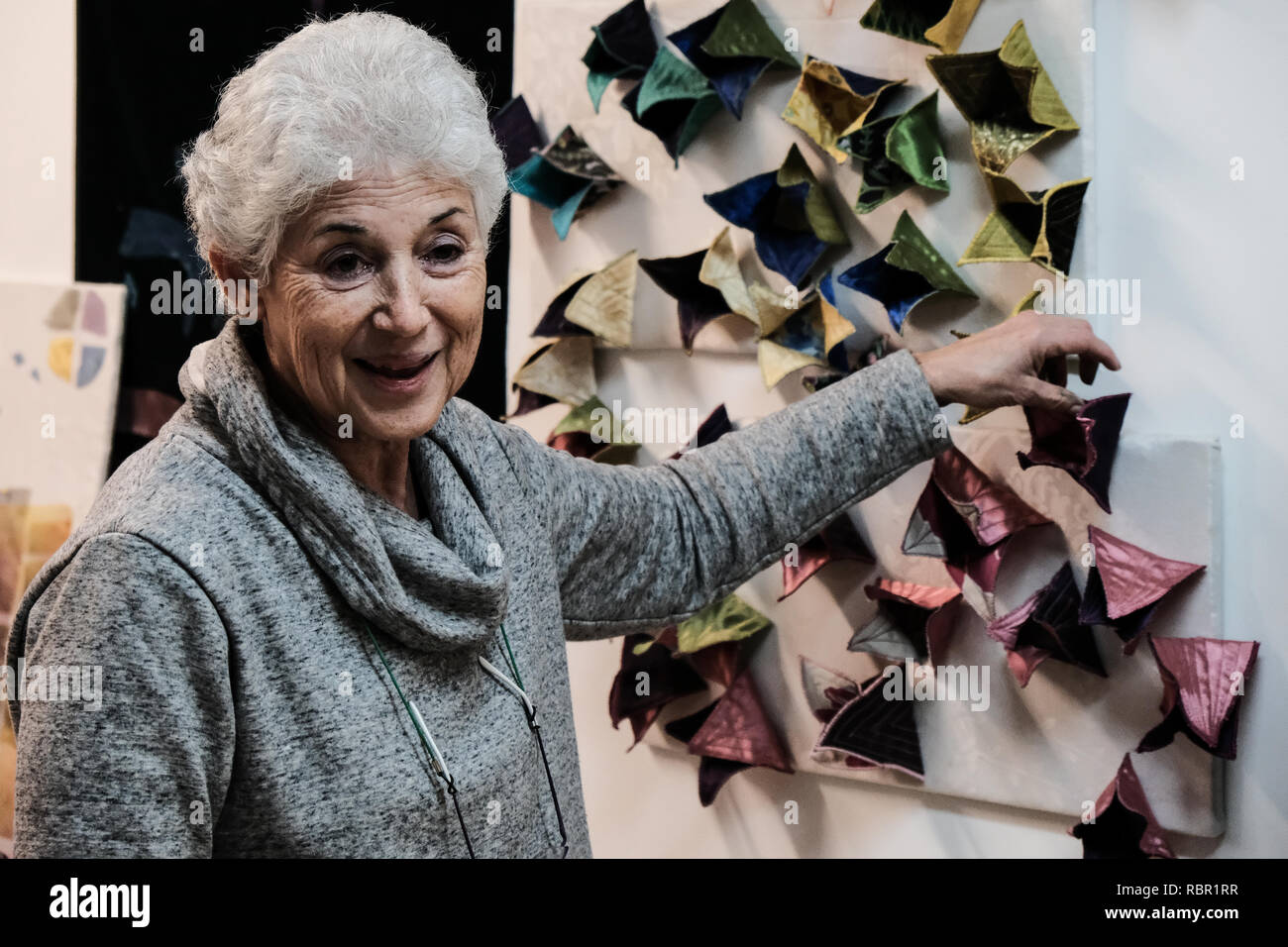 Artist SHARON BINDER displays and explains her work at her store in the ...