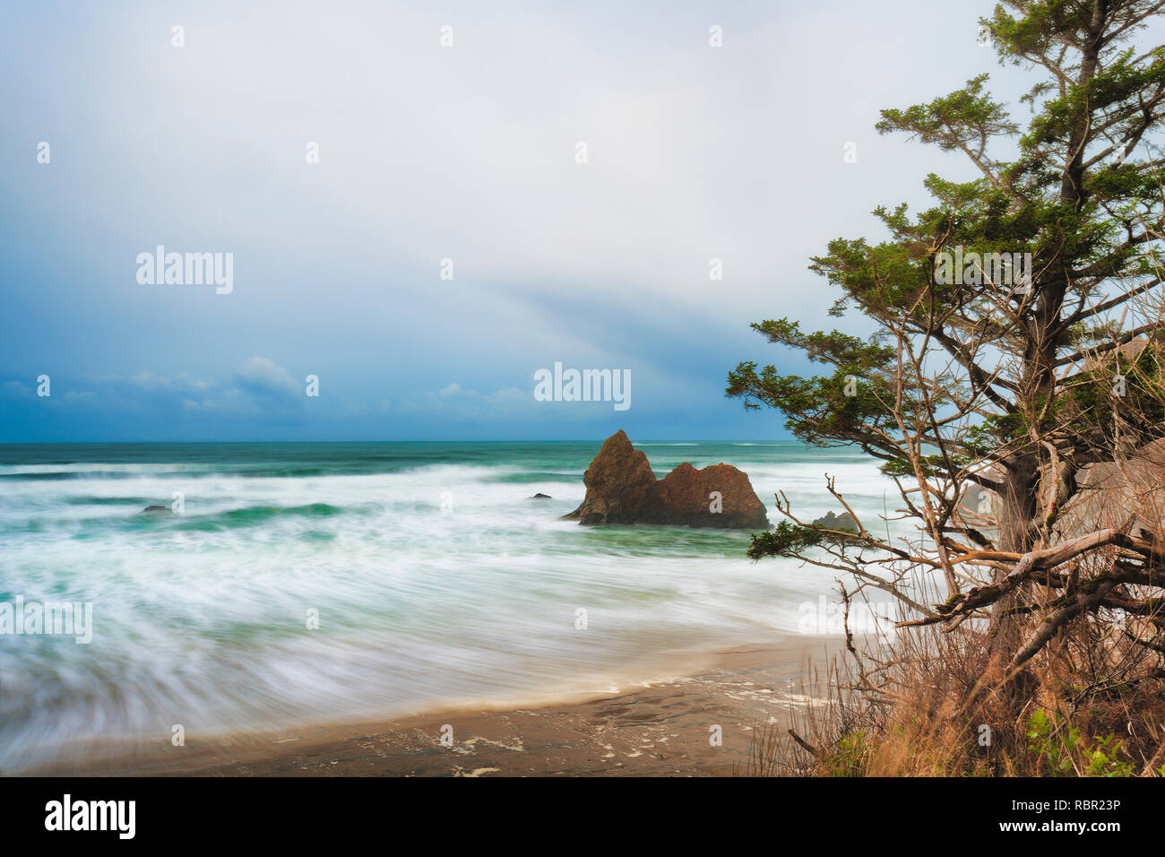 Receding storm clouds hoover over Arcadia Beach near Cannon Beach ...