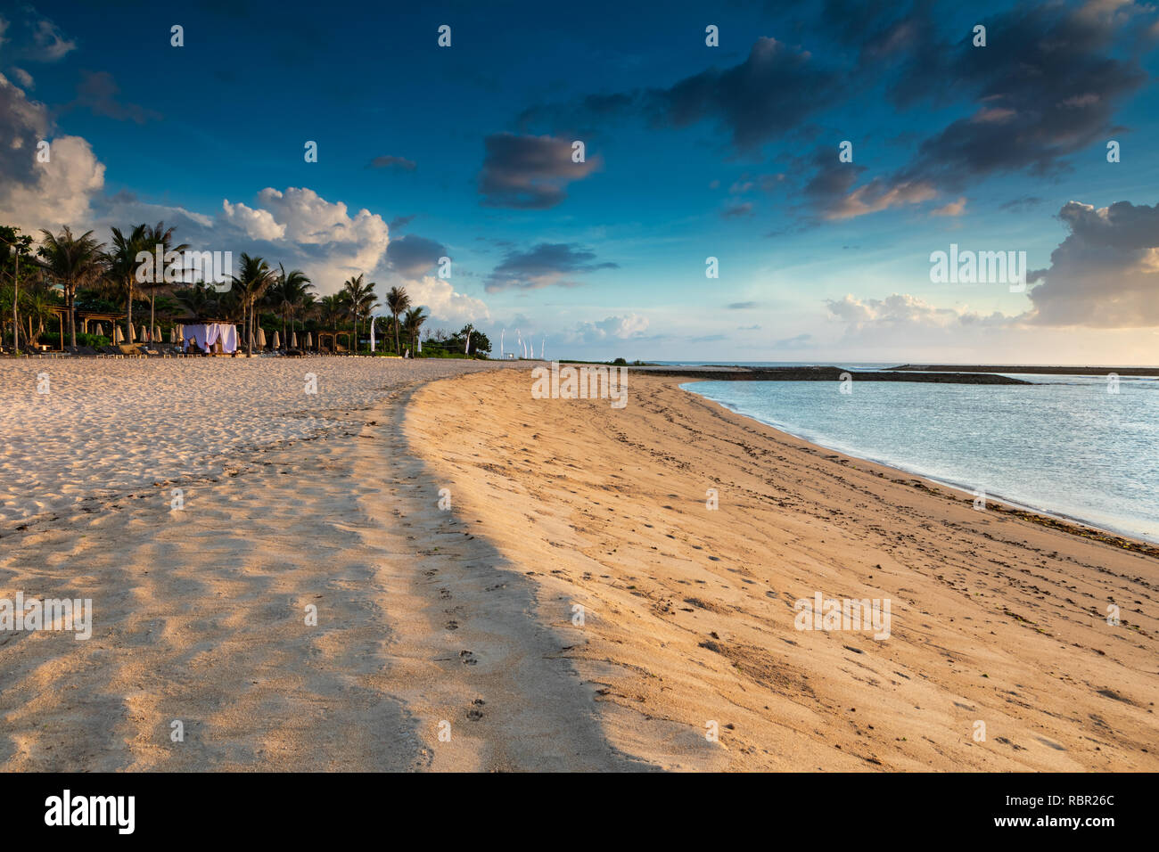 Tropical Beach Sunrise in Bali, Indonesia Stock Photo - Alamy