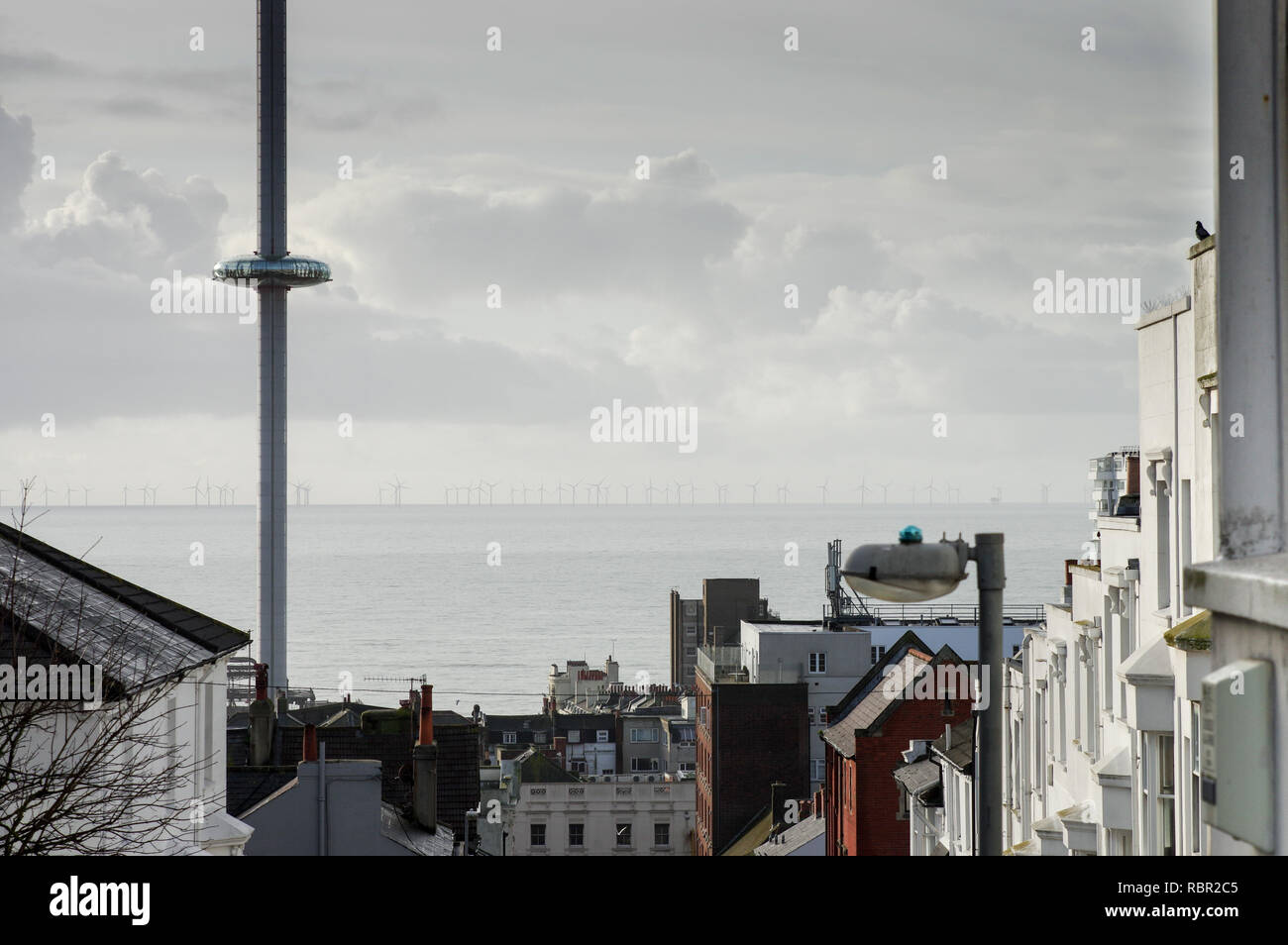 Quiet residential area of Brighton in the winter, with the Rampion Wind ...