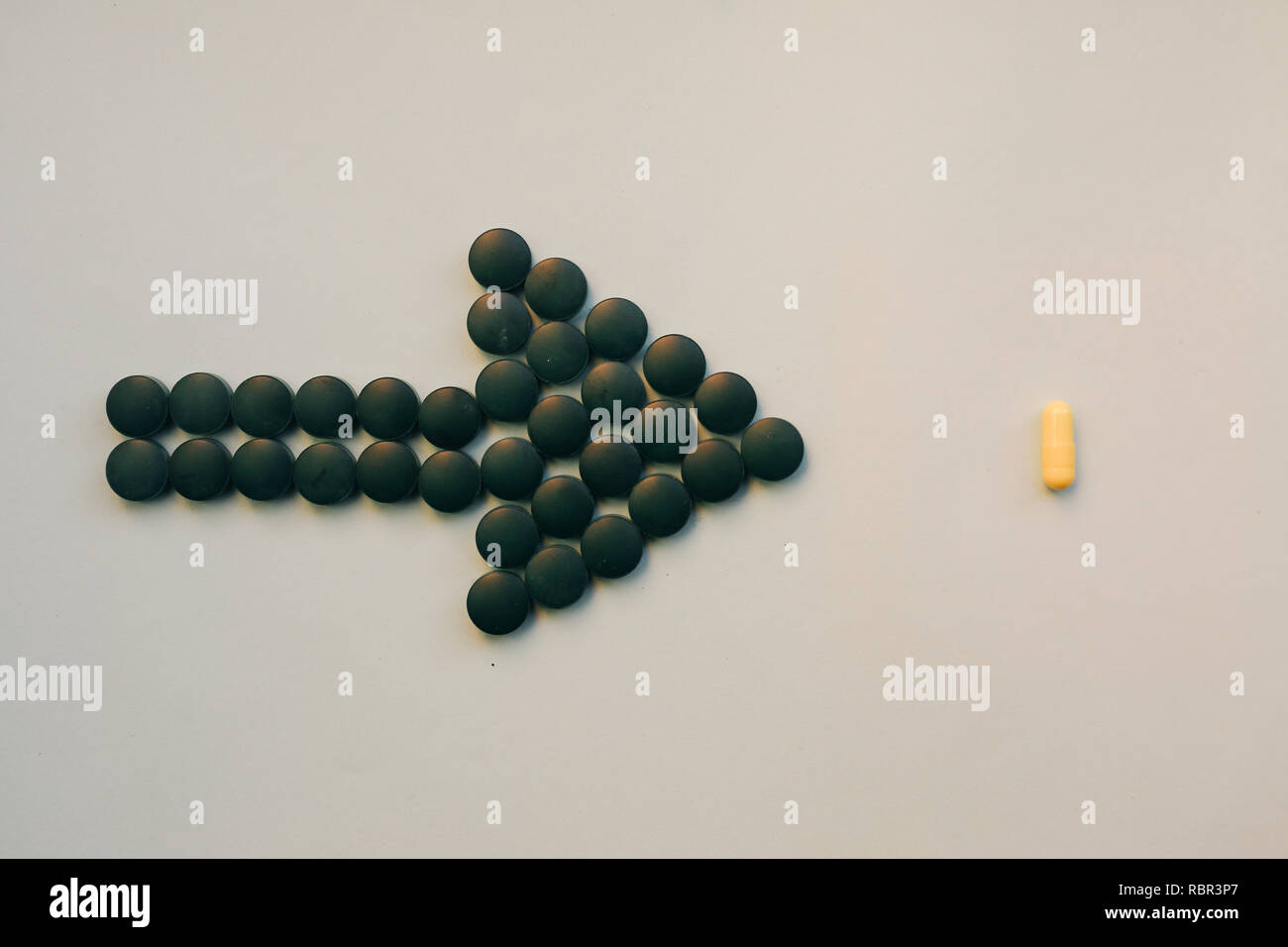 Vitamin pills arrow hi-res stock photography and images - Alamy
