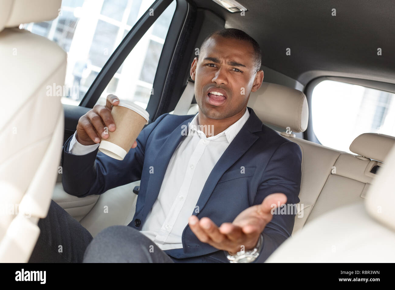 Handsome young driver cup hi-res stock photography and images - Alamy