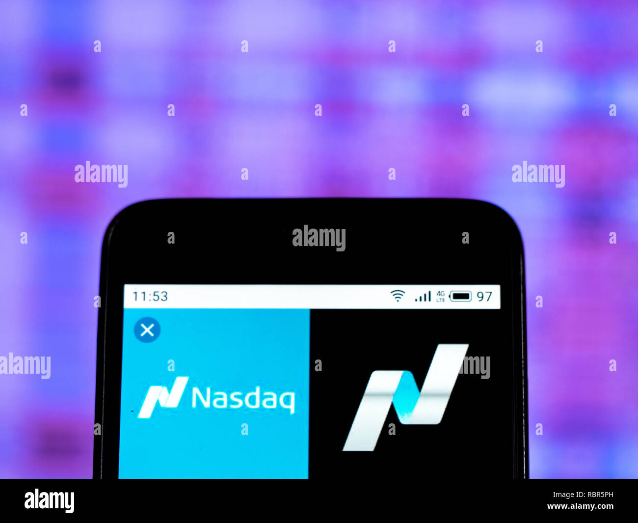 NASDAQ Stock exchange logo seen displayed on smart phone Stock Photo ...