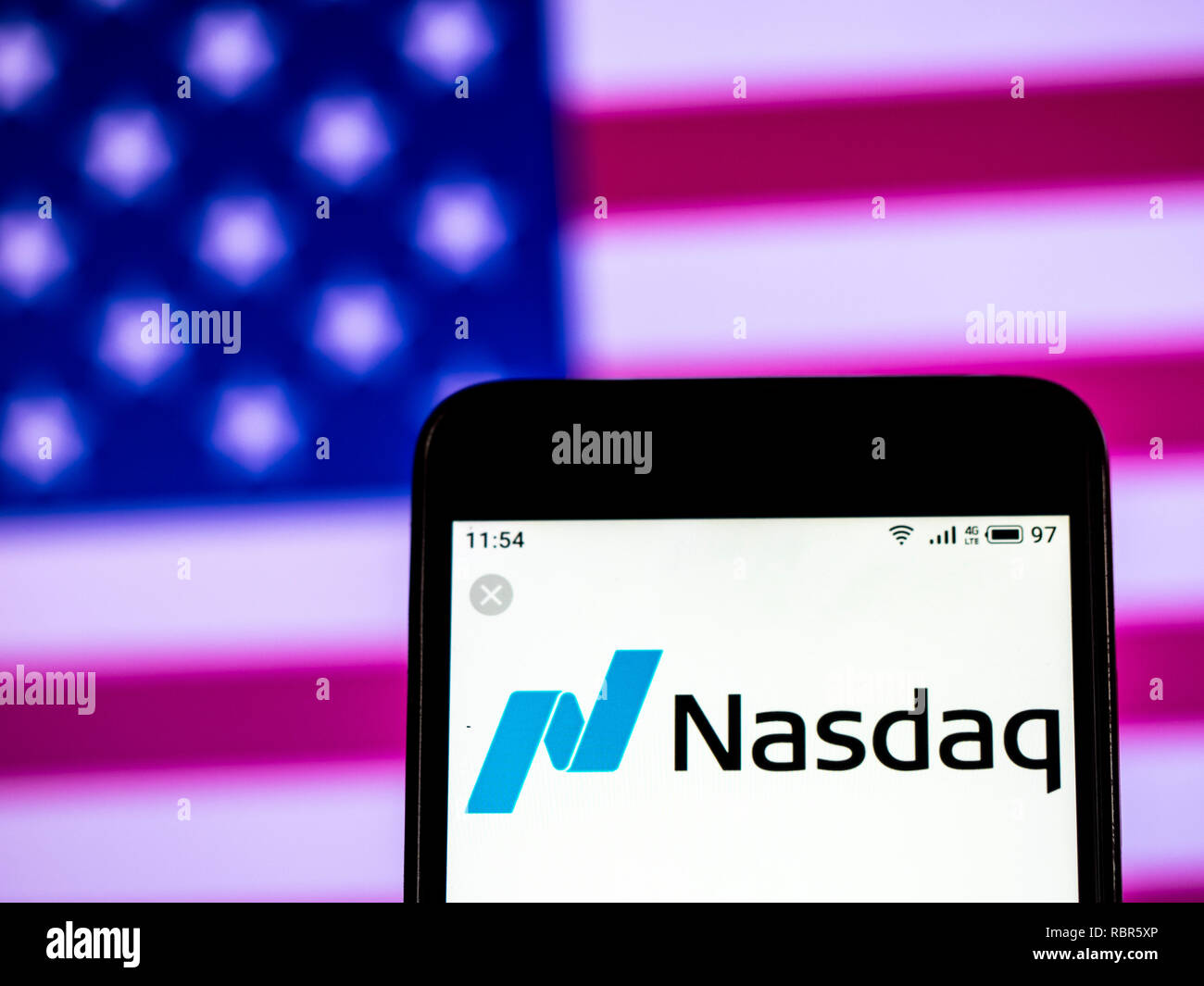 NASDAQ Stock exchange logo seen displayed on smart phone Stock Photo ...