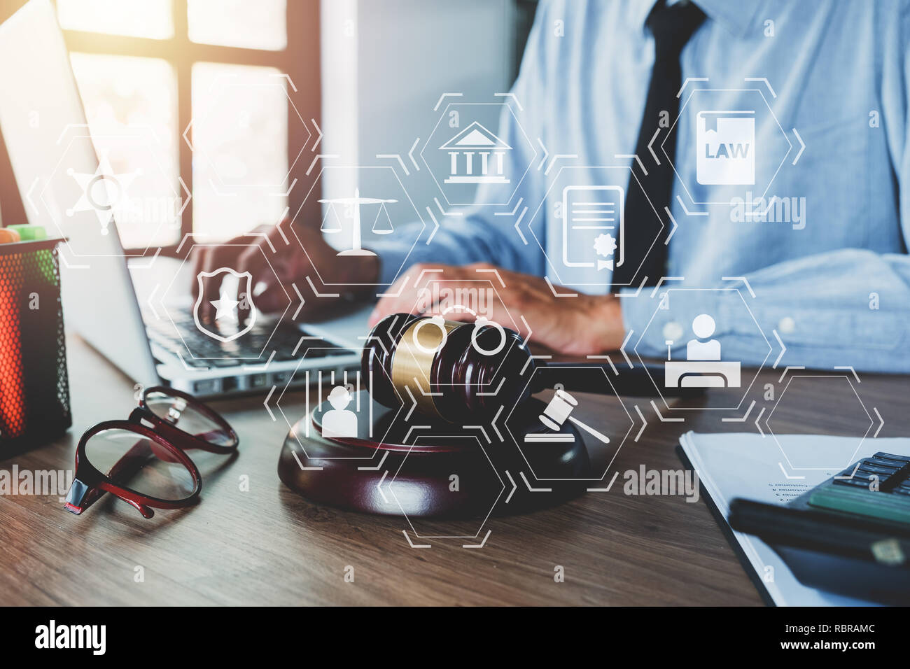 Male judge working with laptop computer, legal books and gavel on white ...