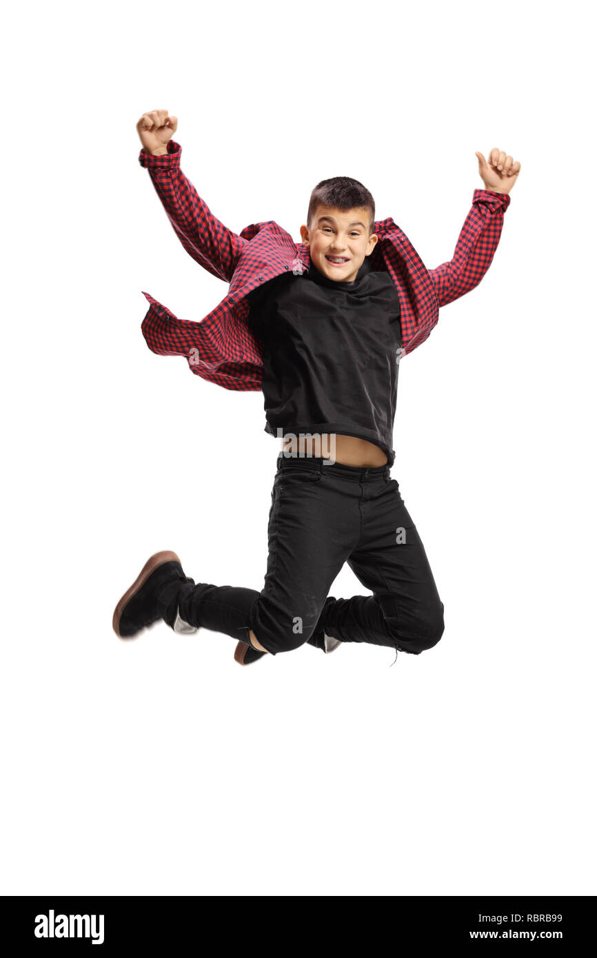 Full length portrait of a teenage boy jumping isolated on white ...