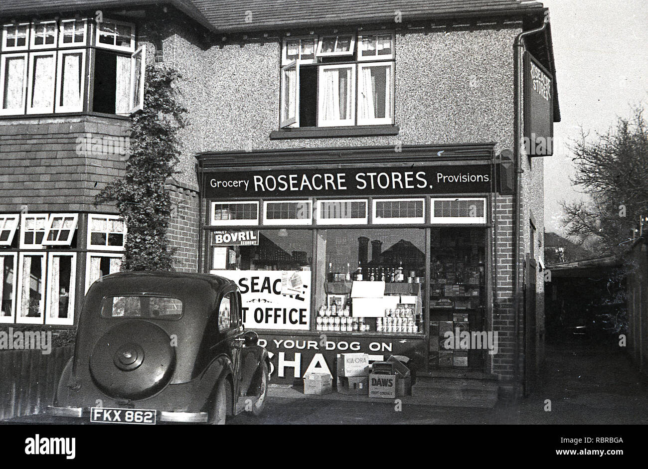 1950s, historical, car of the era parked outside Roseacre Stores and ...