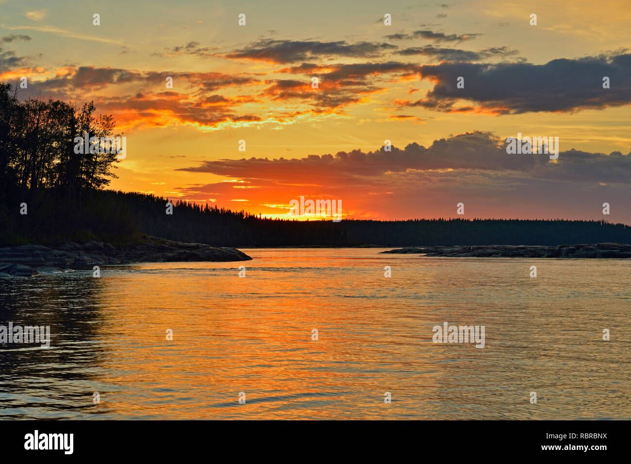 Evening sky reflected slave river hi-res stock photography and images ...