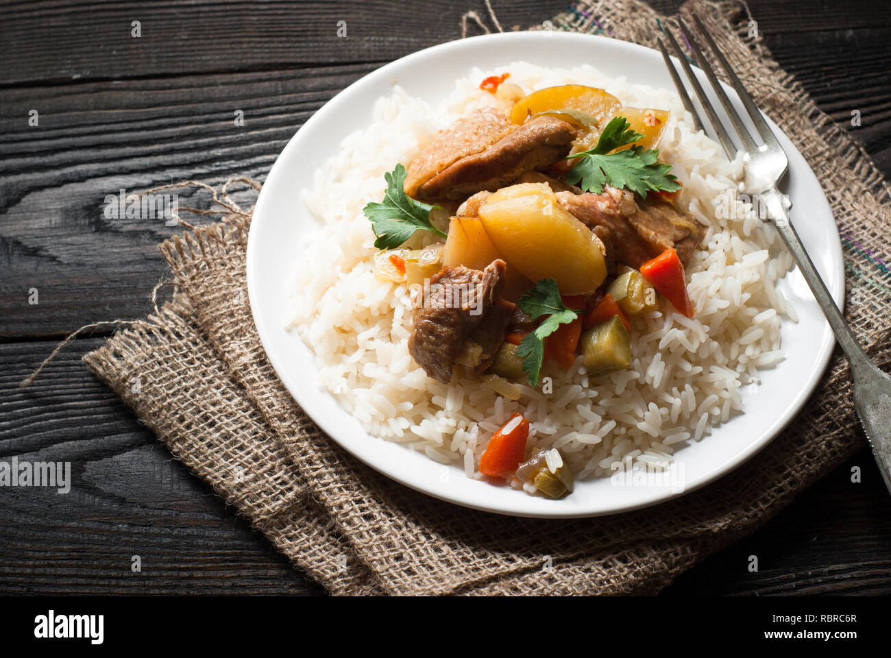 Risotto with white rice, meat and vegetables Stock Photo - Alamy