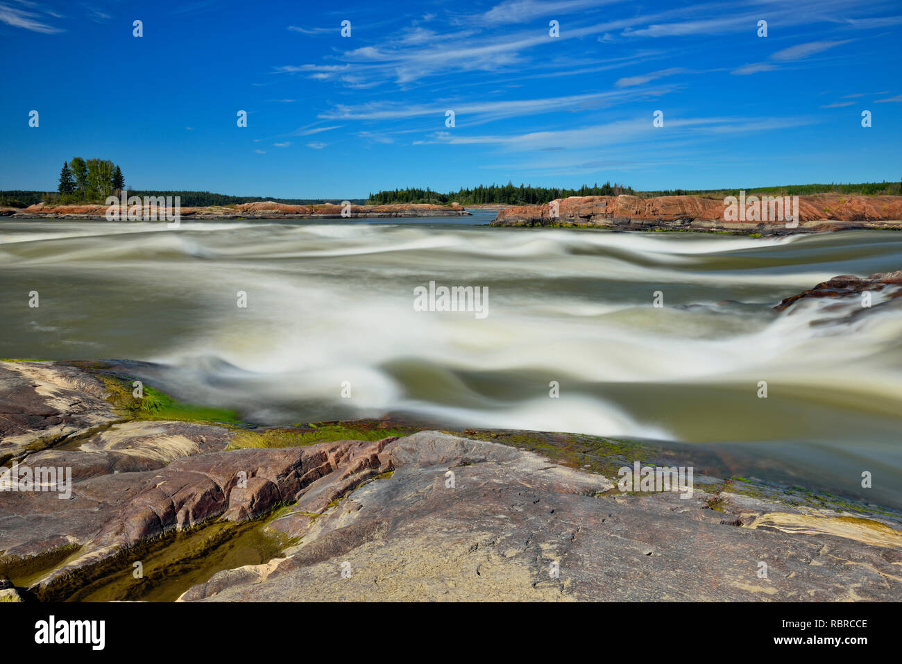 Slave river shoreline near mountain rapids hi-res stock photography and ...