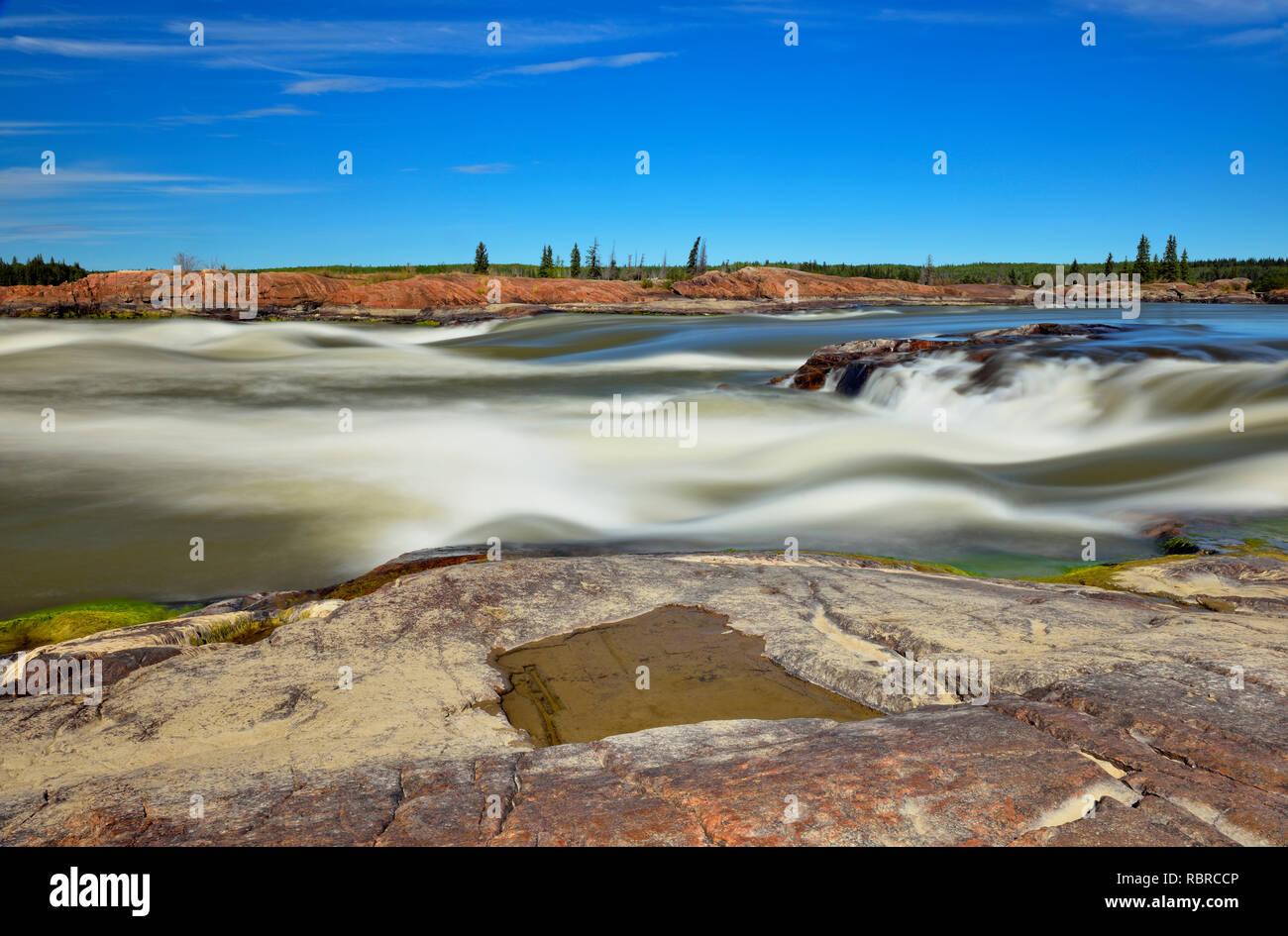 Slave river shoreline near mountain rapids hi-res stock photography and ...