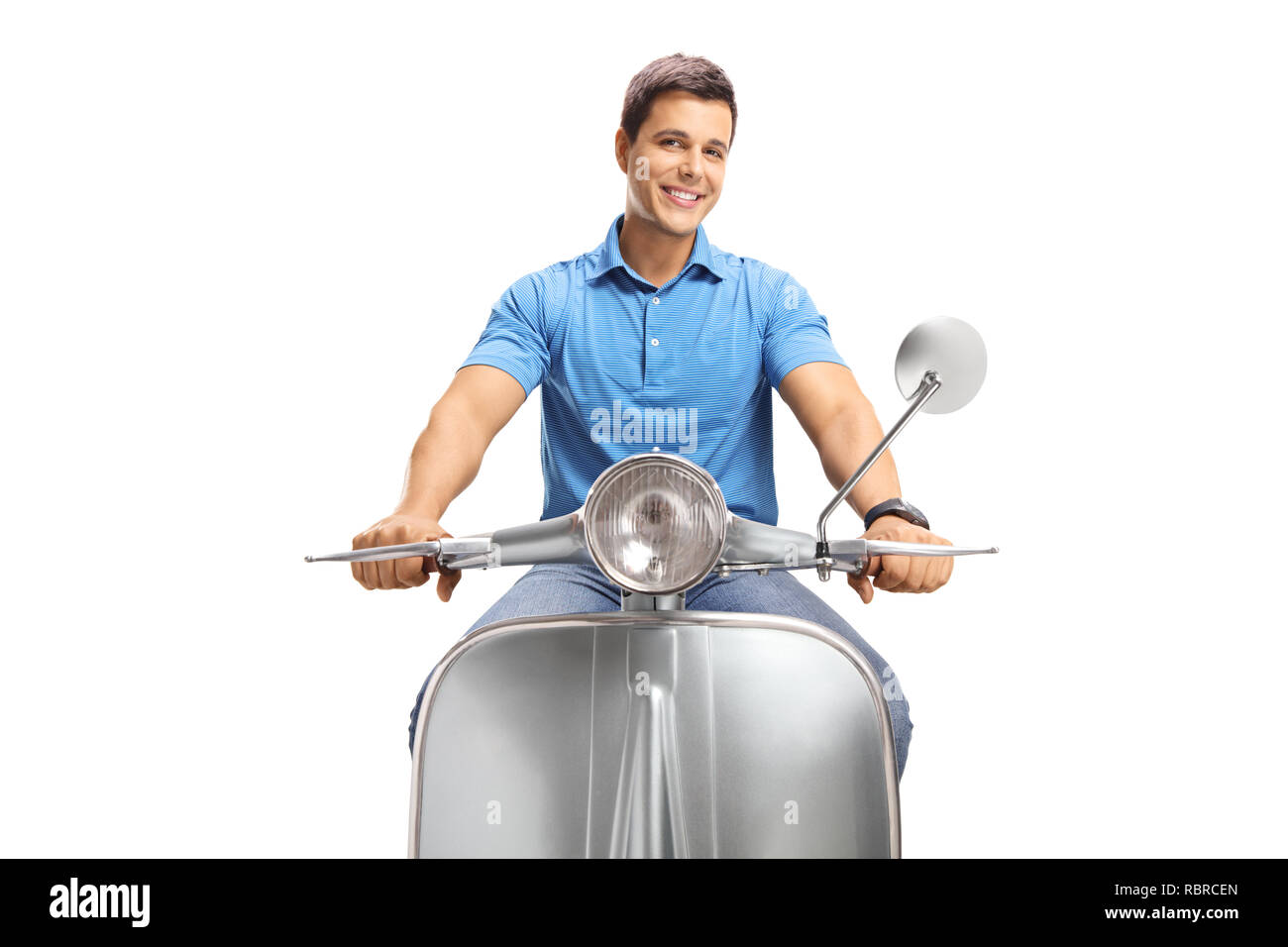 Handsome young man riding a vintage motorbike isolated on white ...