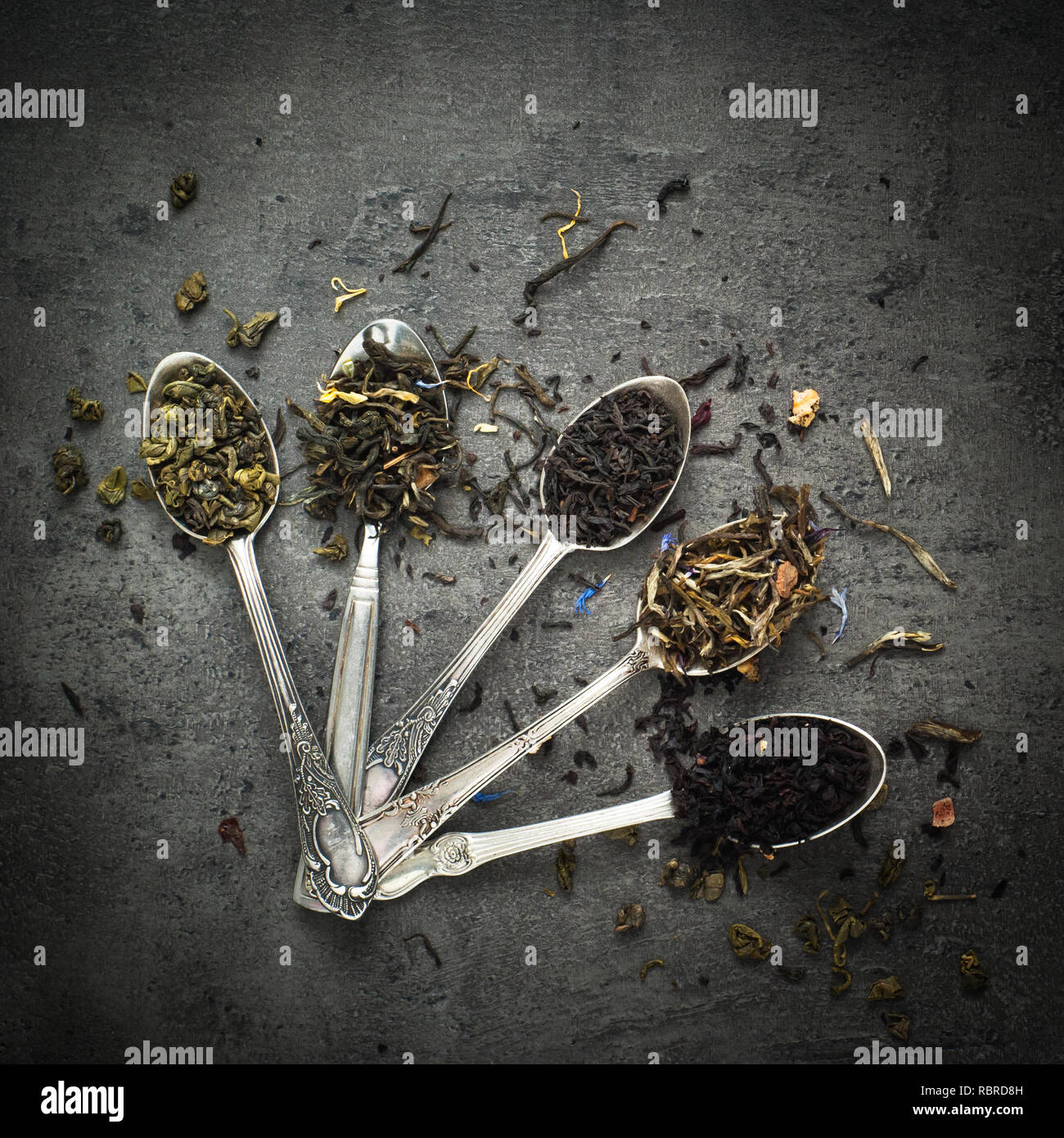 Dry tea in spoon on stone table top view hi-res stock photography and ...