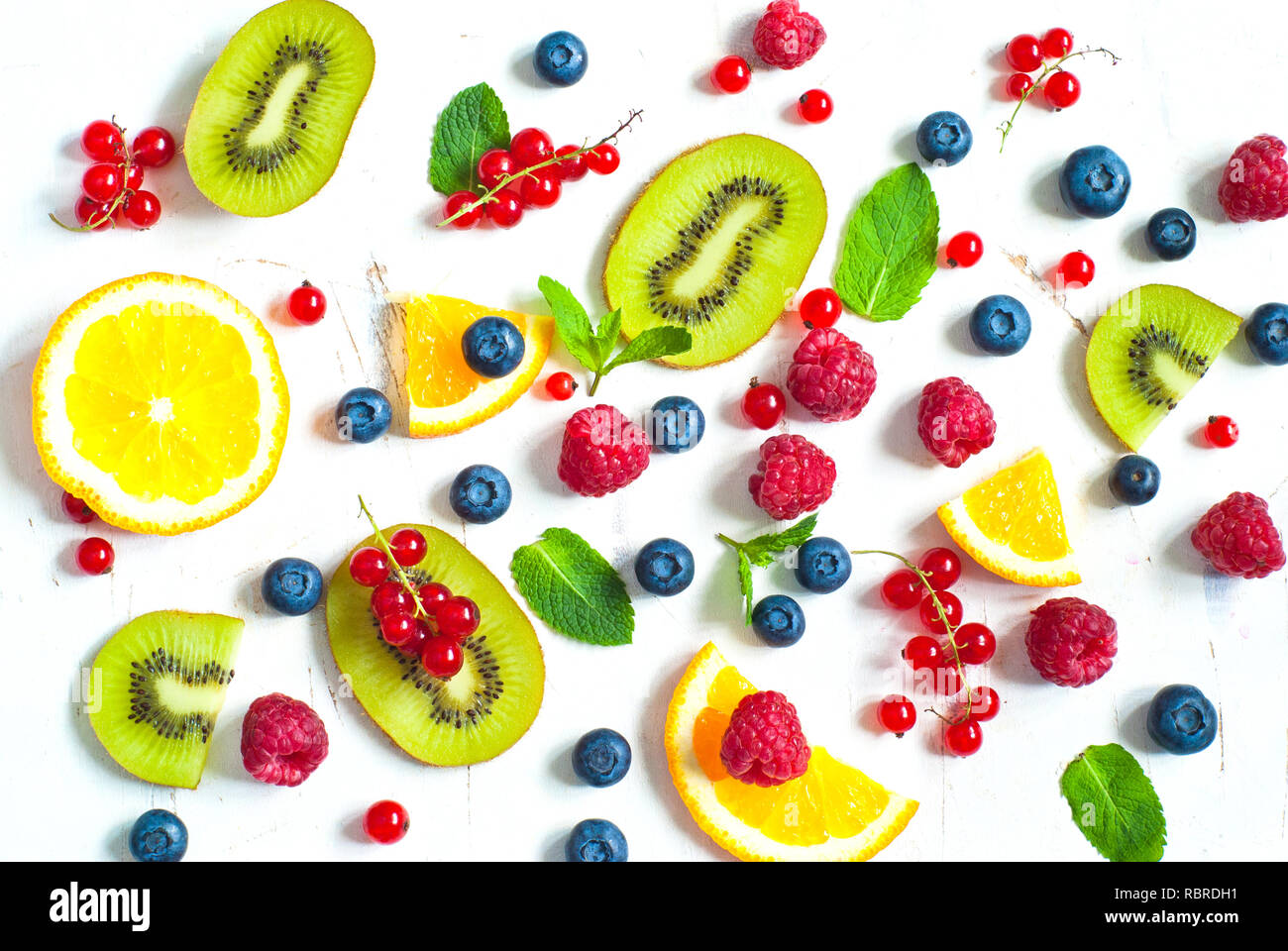 Fresh summer berries and fruits on white background. Healthy food ...