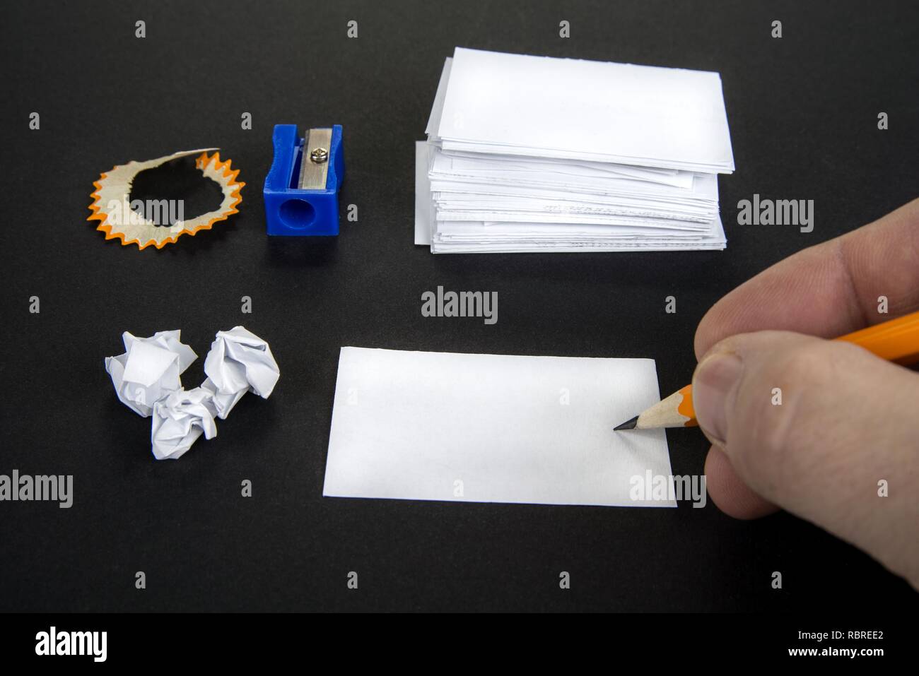 Stack of white paper notes with pencil Stock Photo - Alamy