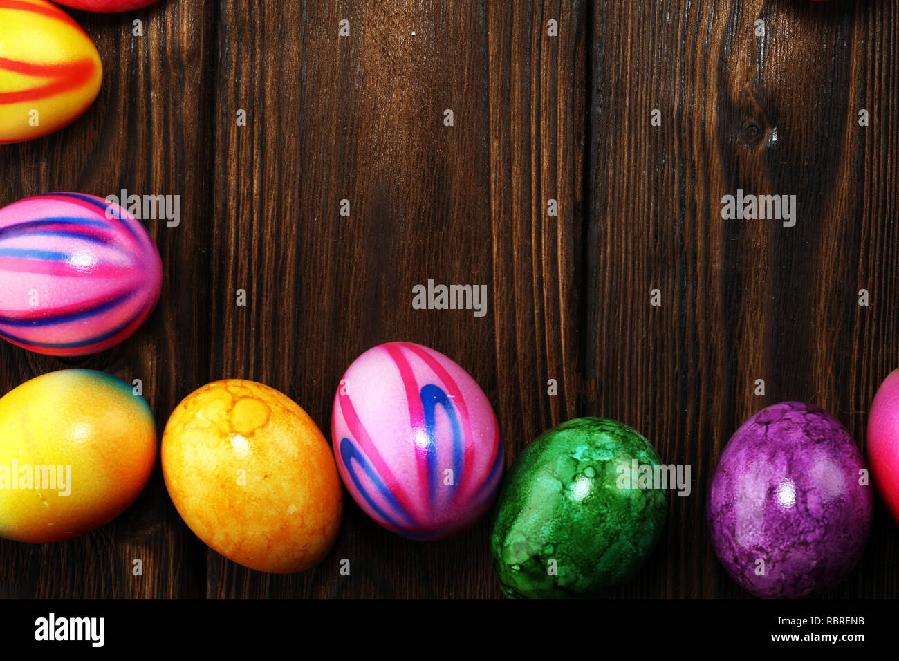 Row of Easter eggs on table. colorful easter decoration Stock Photo - Alamy