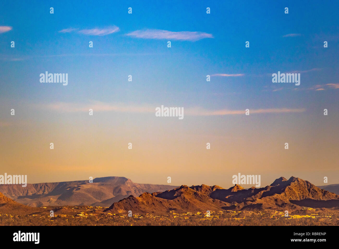 Vanilla Sky with Clouds over Desert mountain range Stock Photo - Alamy