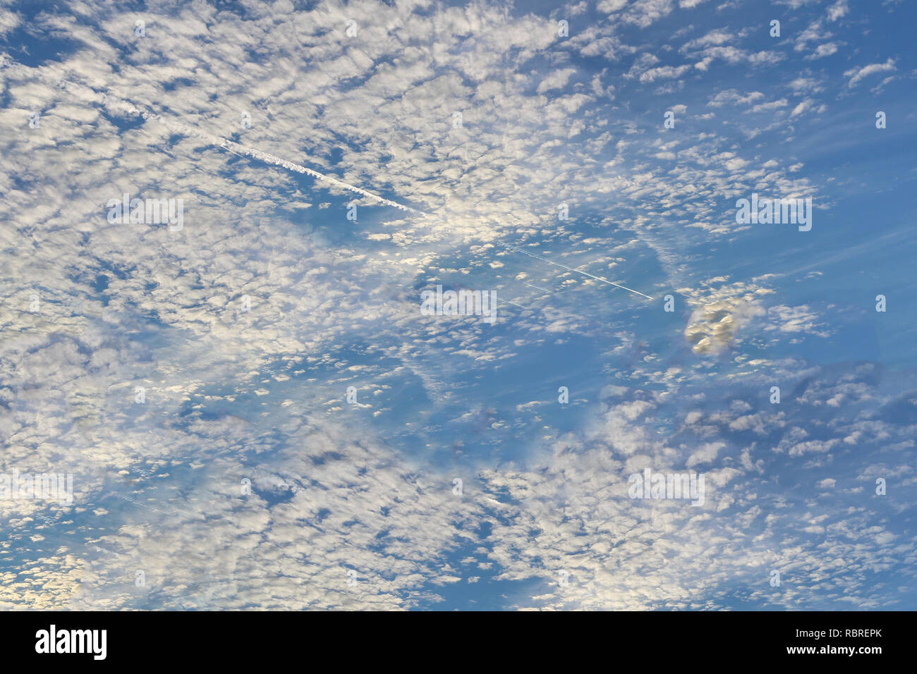 The vast blue sky and clouds lies above surface Earth atmosphere Stock ...