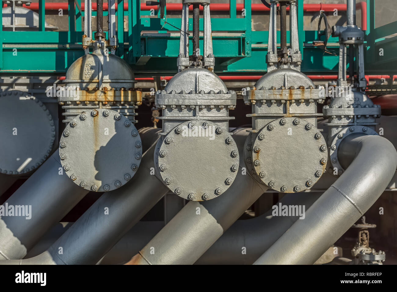 Detailed view of metal valves industries Stock Photo - Alamy