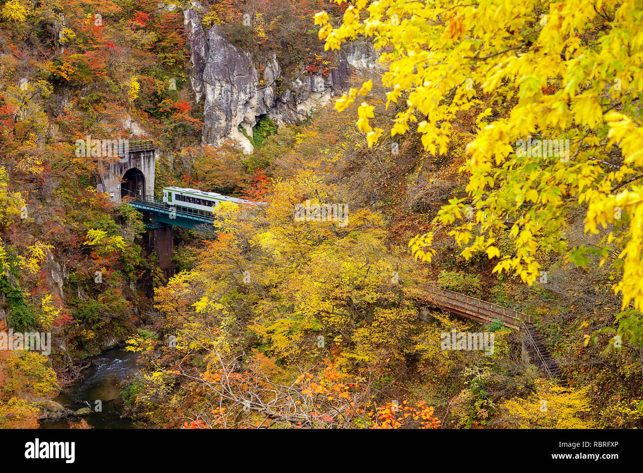 The autumn colors of Naruko Gorge in Japan and nice blue and cloud ...