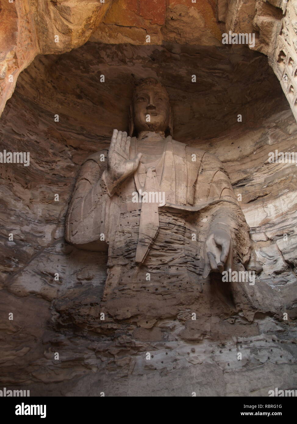 Buddha statue in cave Stock Photo - Alamy