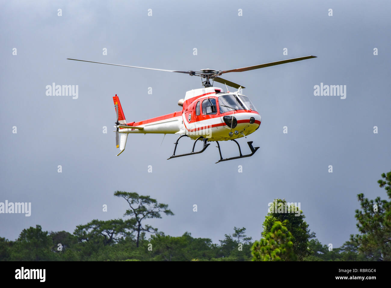 helicopter flying on sky / white red fly helicopter storm on sky with ...