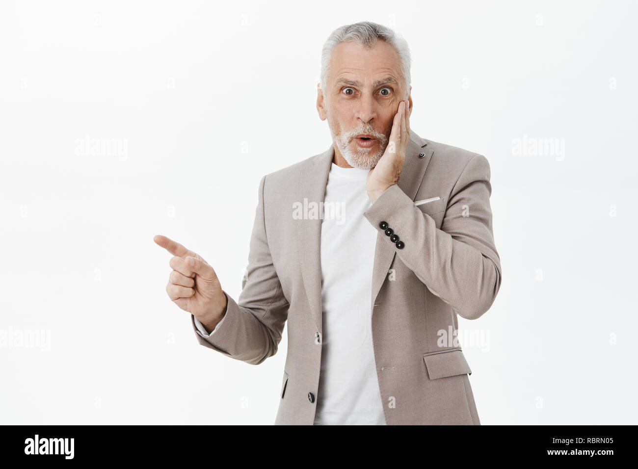 Waist-up shot of amused enthusiastic and happy good-looking fancy old ...