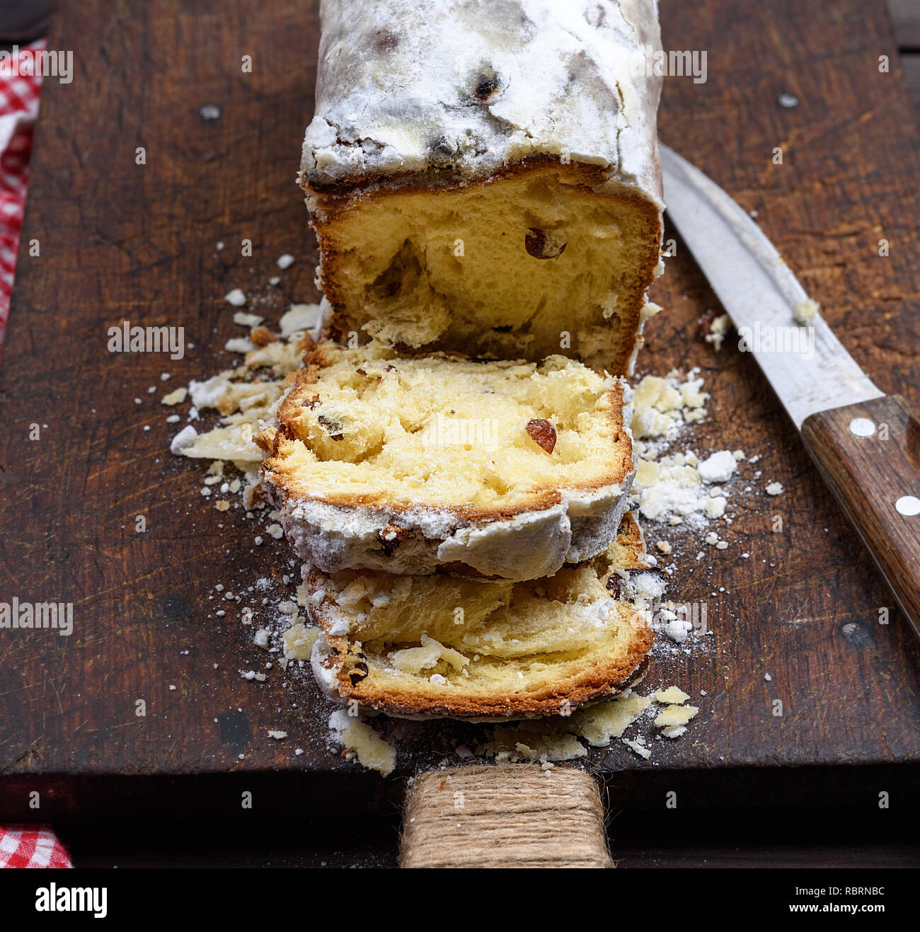 traditional European cake Stollen with nuts and candied fruit, close up ...