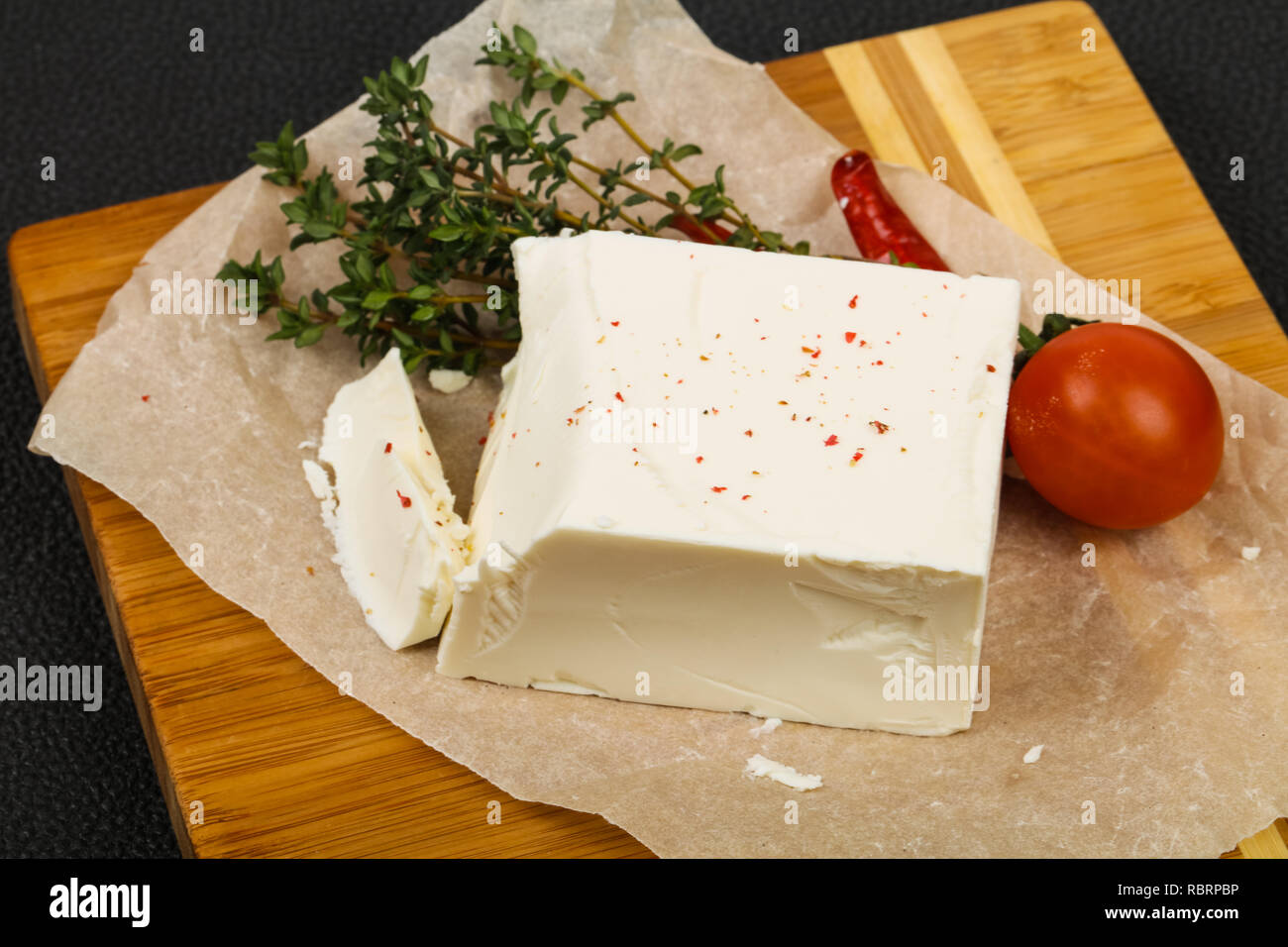 Traditional Feta Cheese served thyme Stock Photo - Alamy