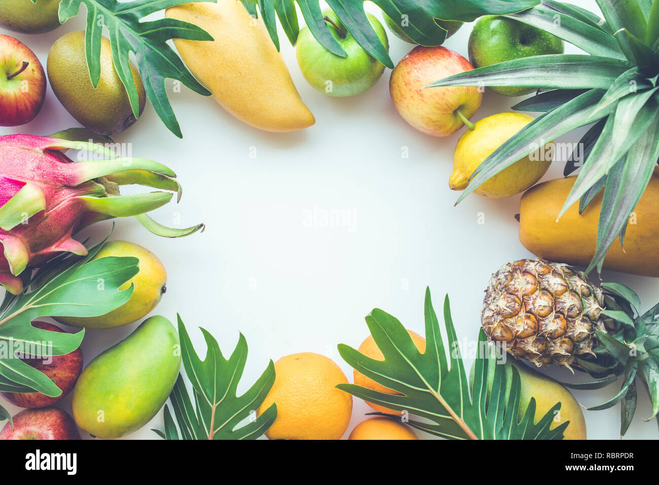 Group of fruits on white space background Stock Photo - Alamy