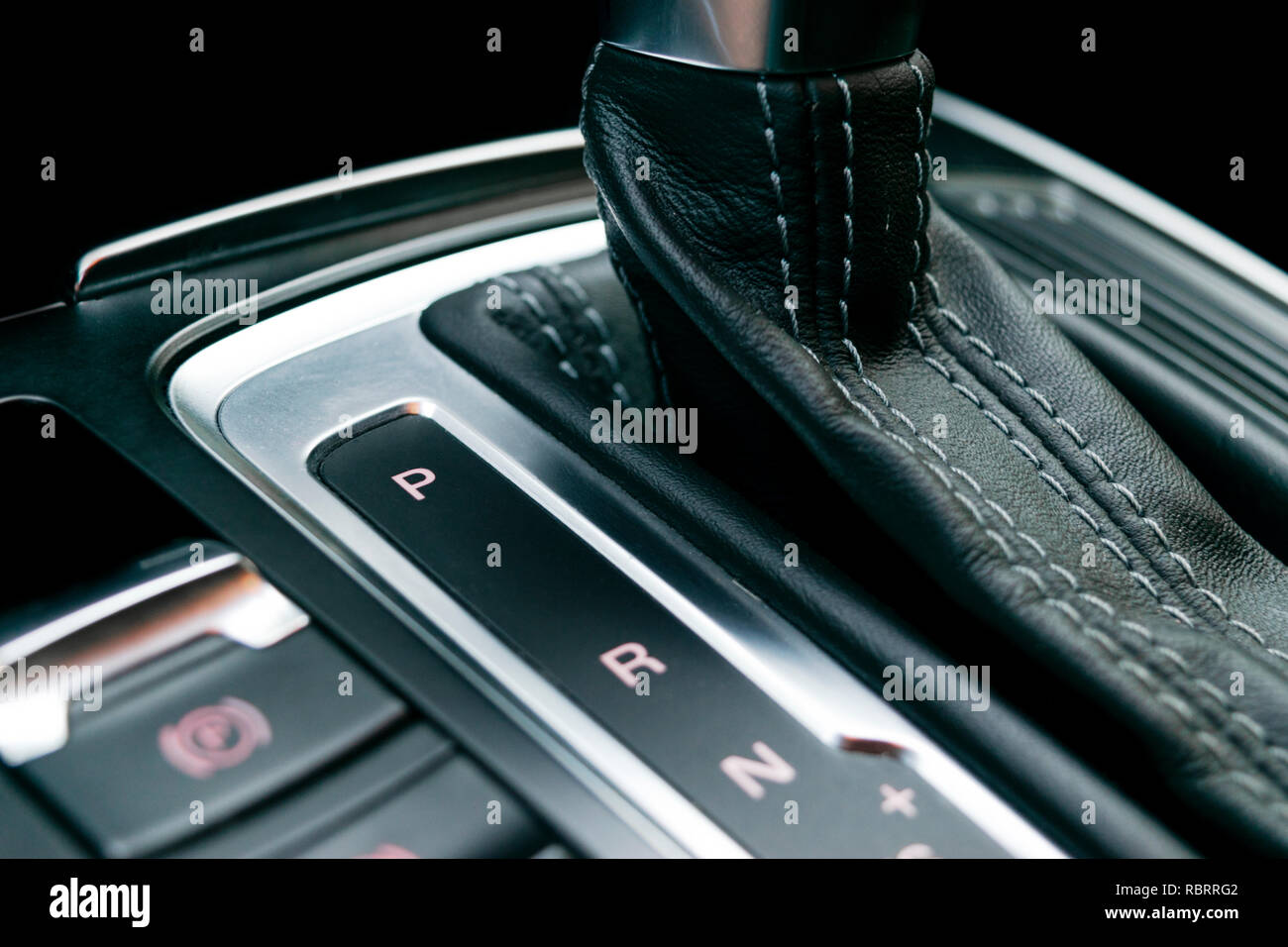 Automatic gear stick of a modern car. Maodern car interior details. Close up view. Car detailing ...