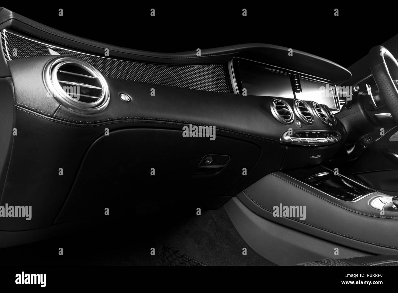 Modern Luxury car inside. Interior of a modern car. Comfortable leather ...