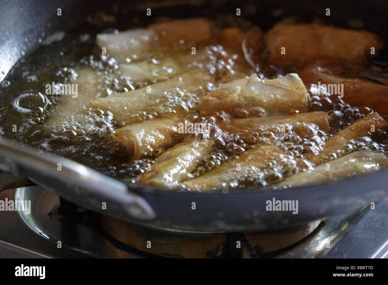 Spring roll cooking Stock Photo - Alamy