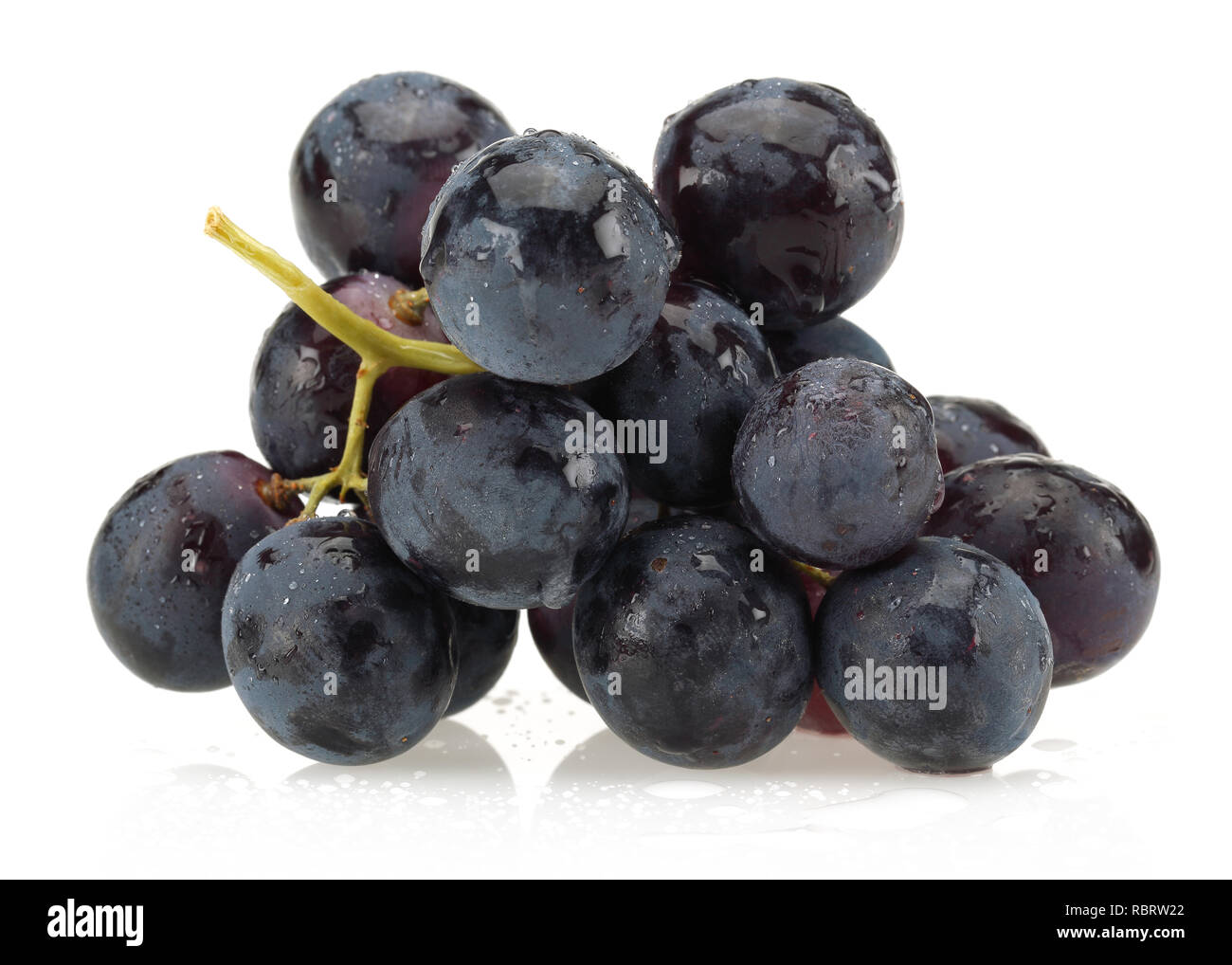 Bunch of black grapes isolated on white background Stock Photo - Alamy