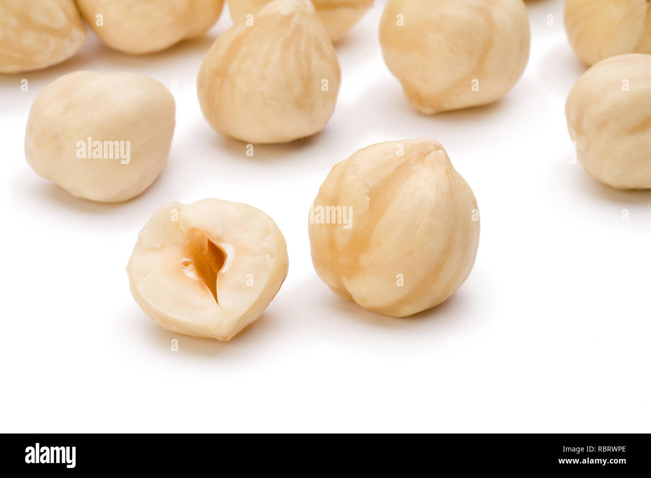 Peeled hazelnuts isolated on white background. Macro, studio shot Stock ...