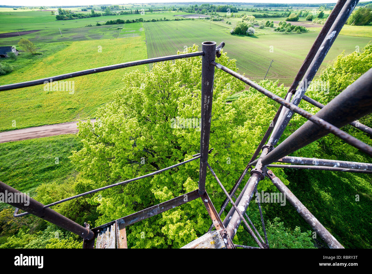 watchtower details and wooden bars, stairs and walls from below up ...
