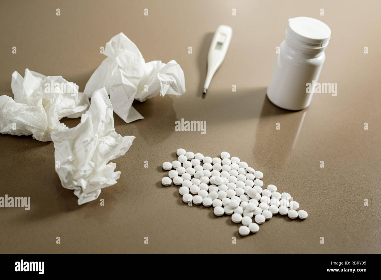 Concept of cold and treatment with medicines, dirty snot paper tissues ...