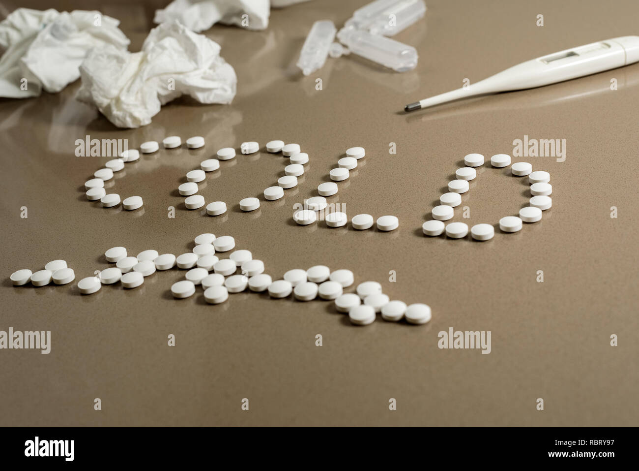 Concept of cold and treatment with medicines, dirty snot paper tissues ...