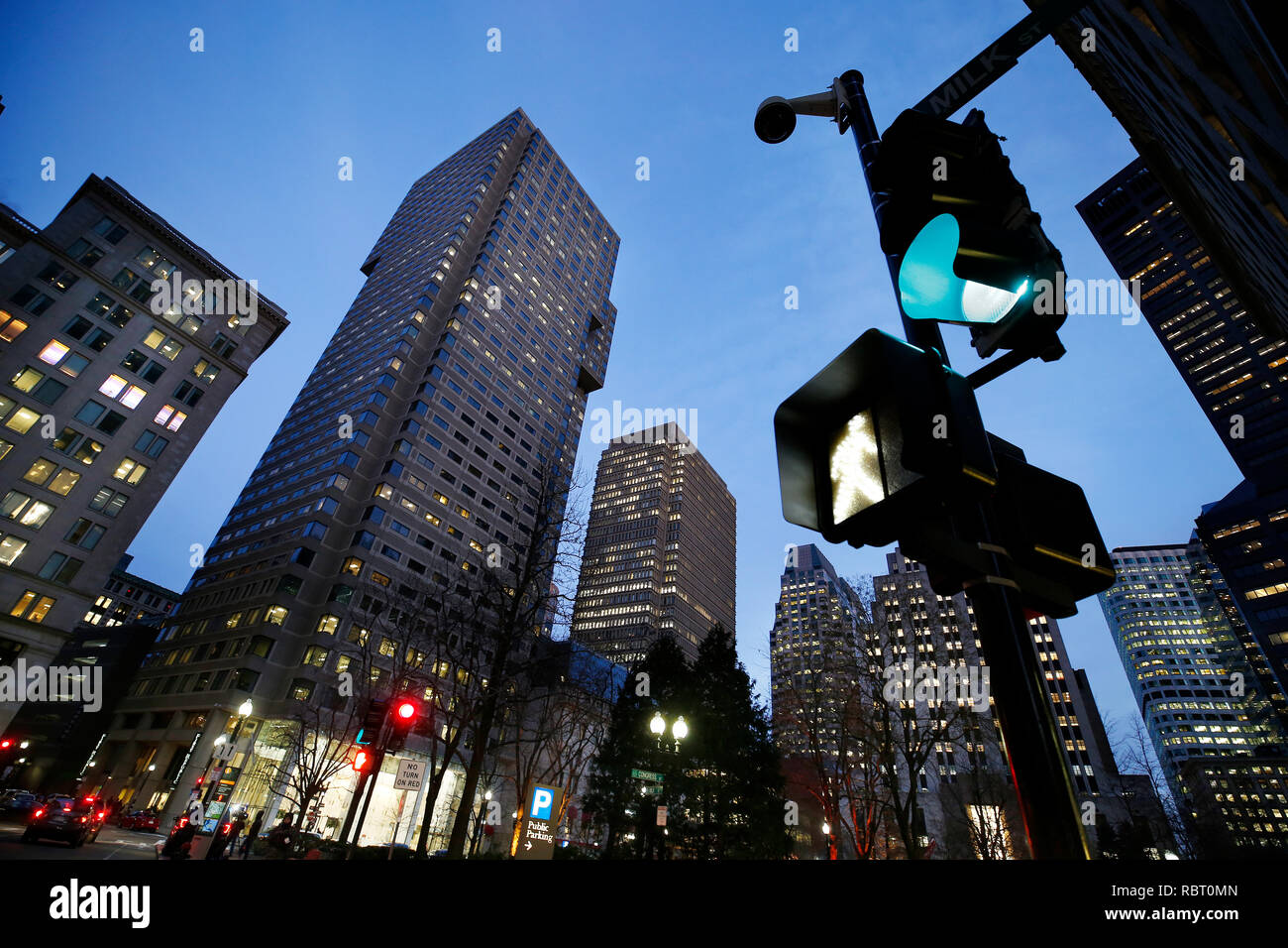Downtown Boston office buildings from street level, dusk, blue hour ...